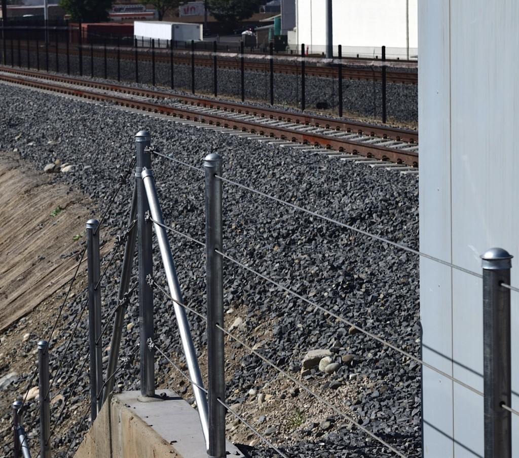 C&W completes a portion of the right-of-way fence, cable rail and 1 ...